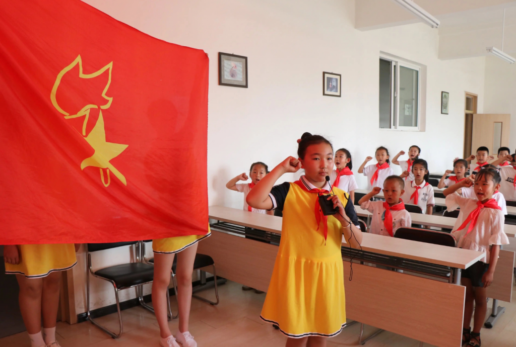 Why Is Red Scarf Worn By School Children In China?